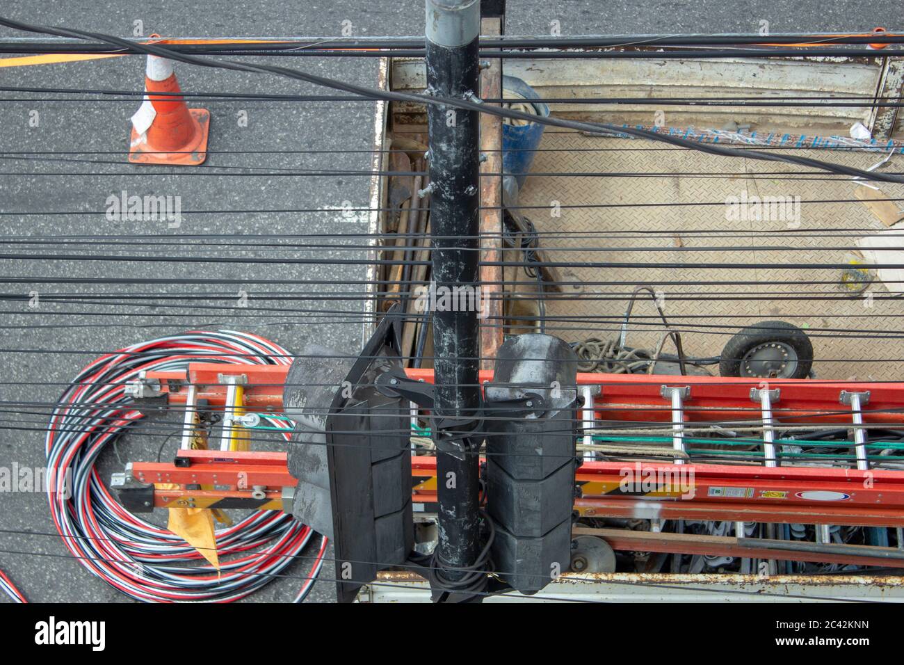 Truck full of equipments of a electrical company while doing a repair ...
