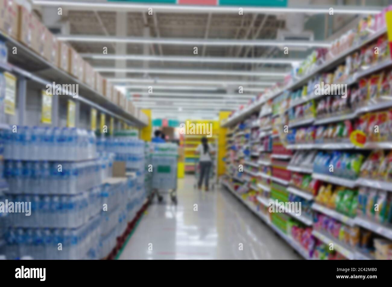 Supermarket blur the shelves for goods and food background Stock Photo ...