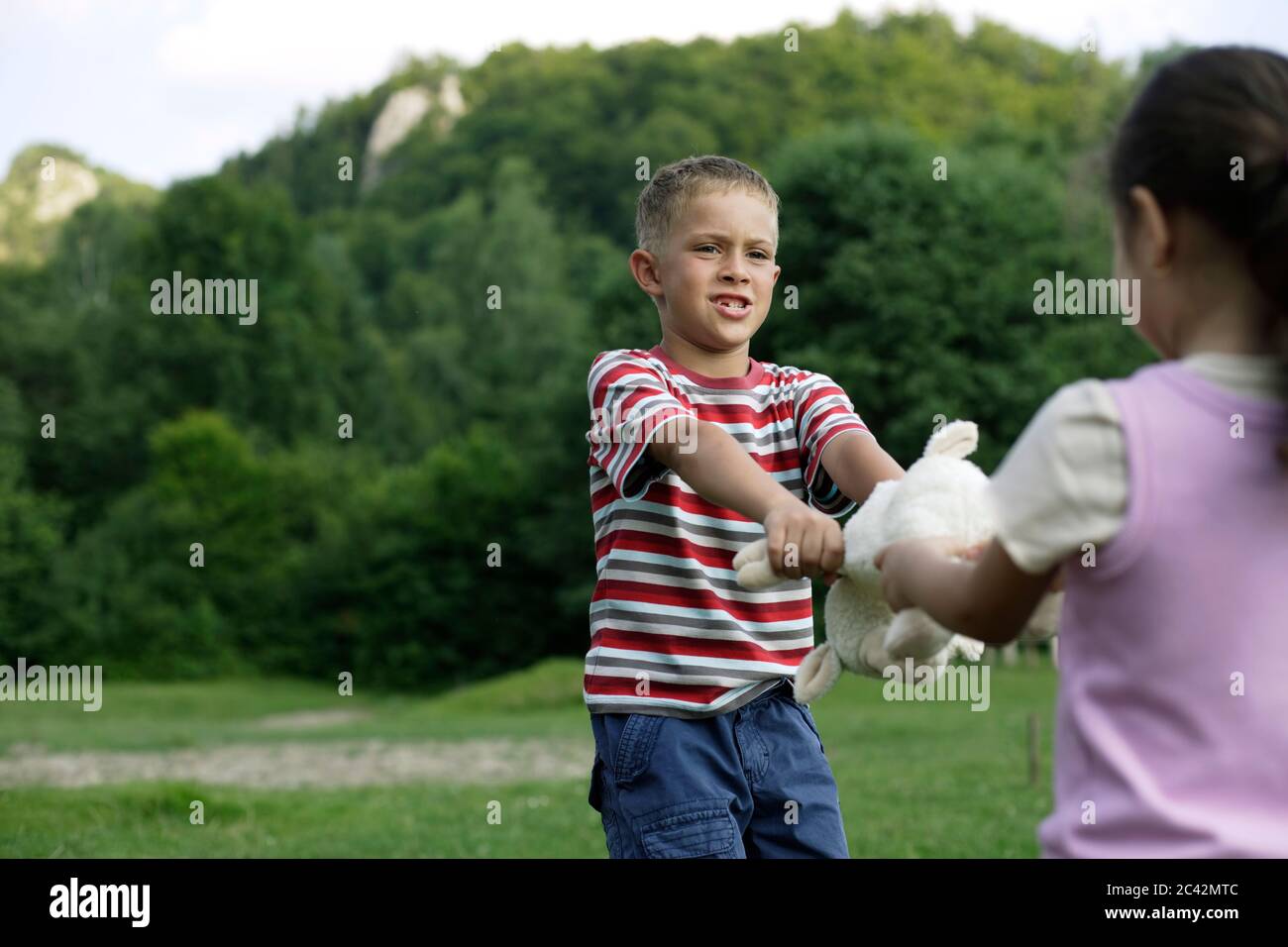 Children fight over toy hi-res stock photography and images - Alamy