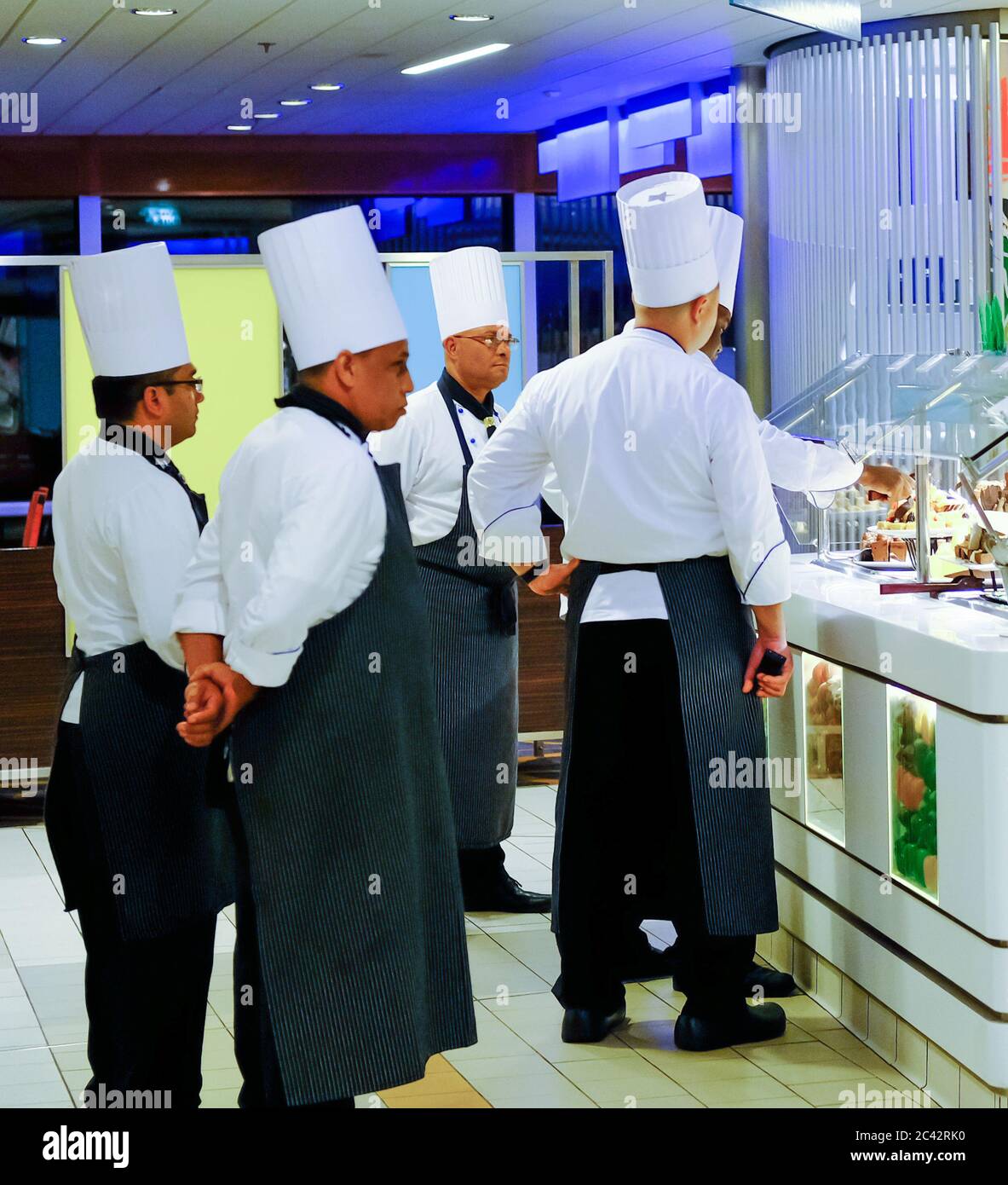 Chefs Inspecting Buffet on Ship Stock Photo - Alamy