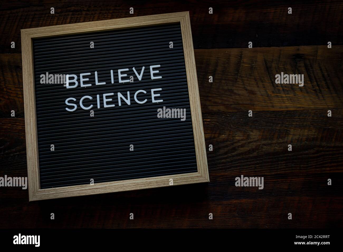 Belive Science message board with Copy Space Stock Photo - Alamy