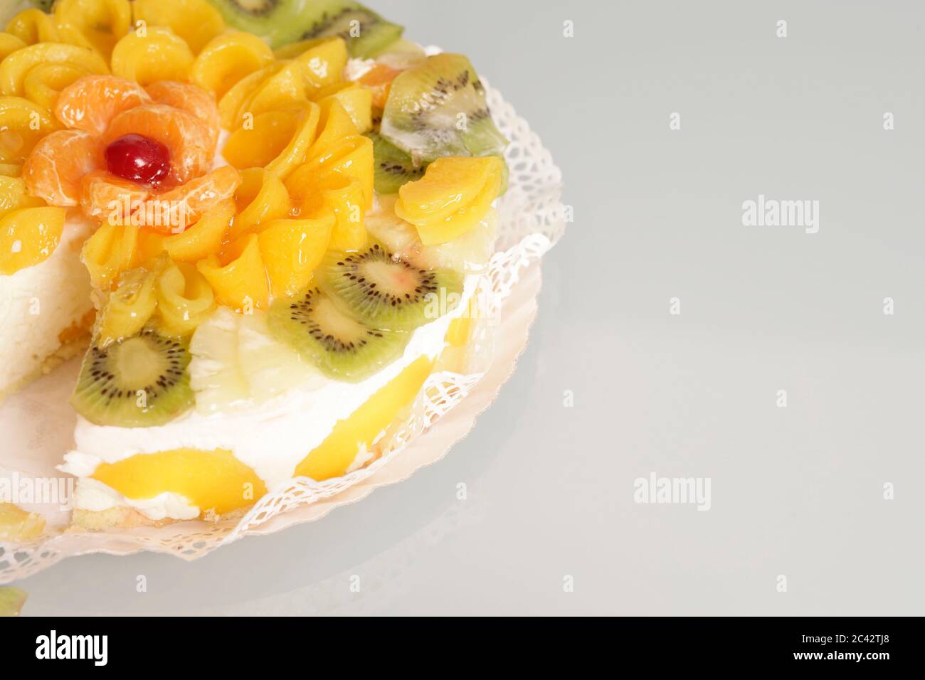 Cut fruit cake - dessert - food Stock Photo - Alamy
