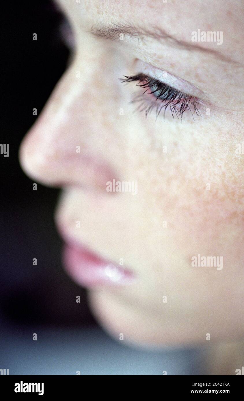 Young woman looks sad - look - emotion Stock Photo - Alamy