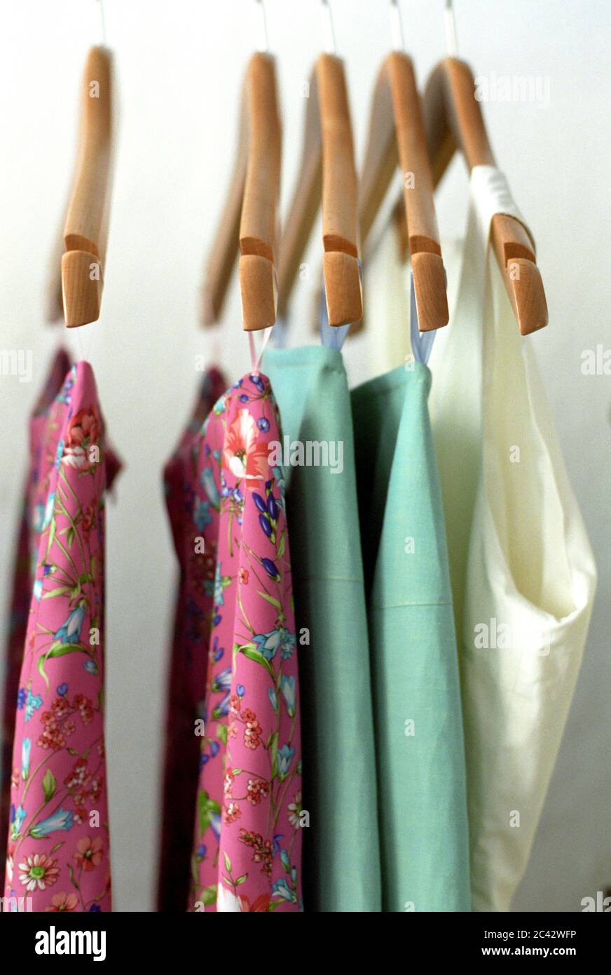 Textiles on hangers - shopping - fashion Stock Photo - Alamy