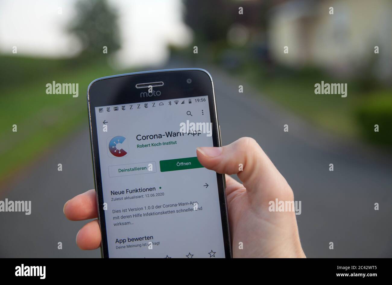 The official German Corona warning app software is displayed on a ...