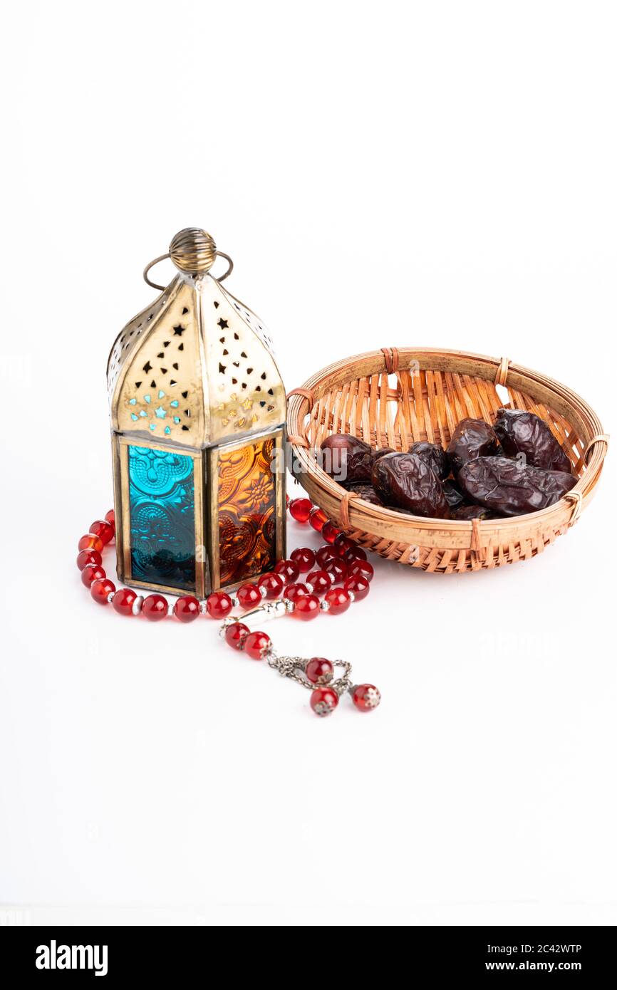 Ramadhan concept. Arabic lantern and dates isolated against white Stock ...