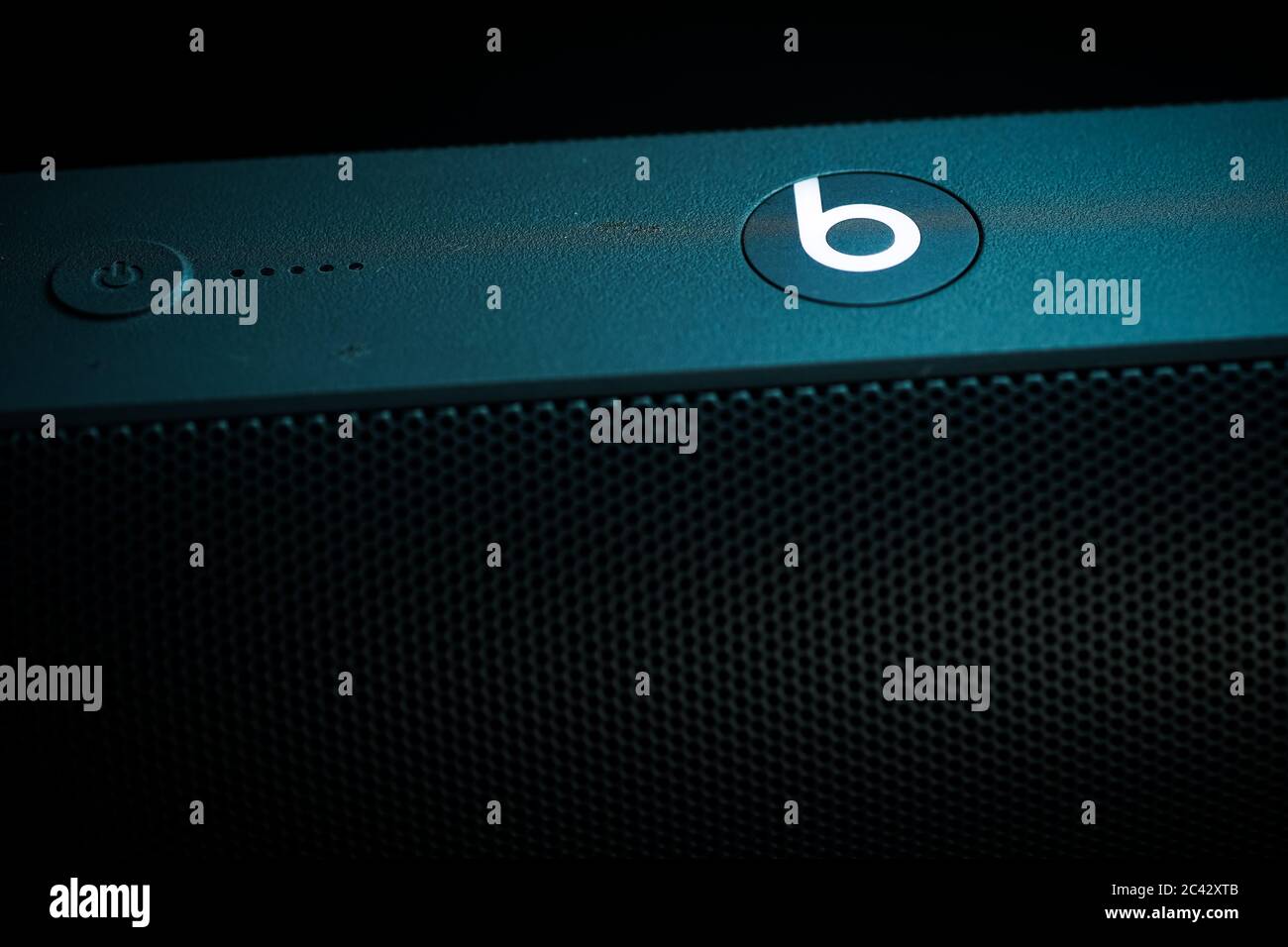 Grey colour Beats Pill wireless speaker against black background Stock ...