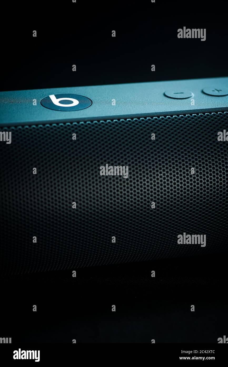 Grey colour Beats Pill wireless speaker against black background Stock ...