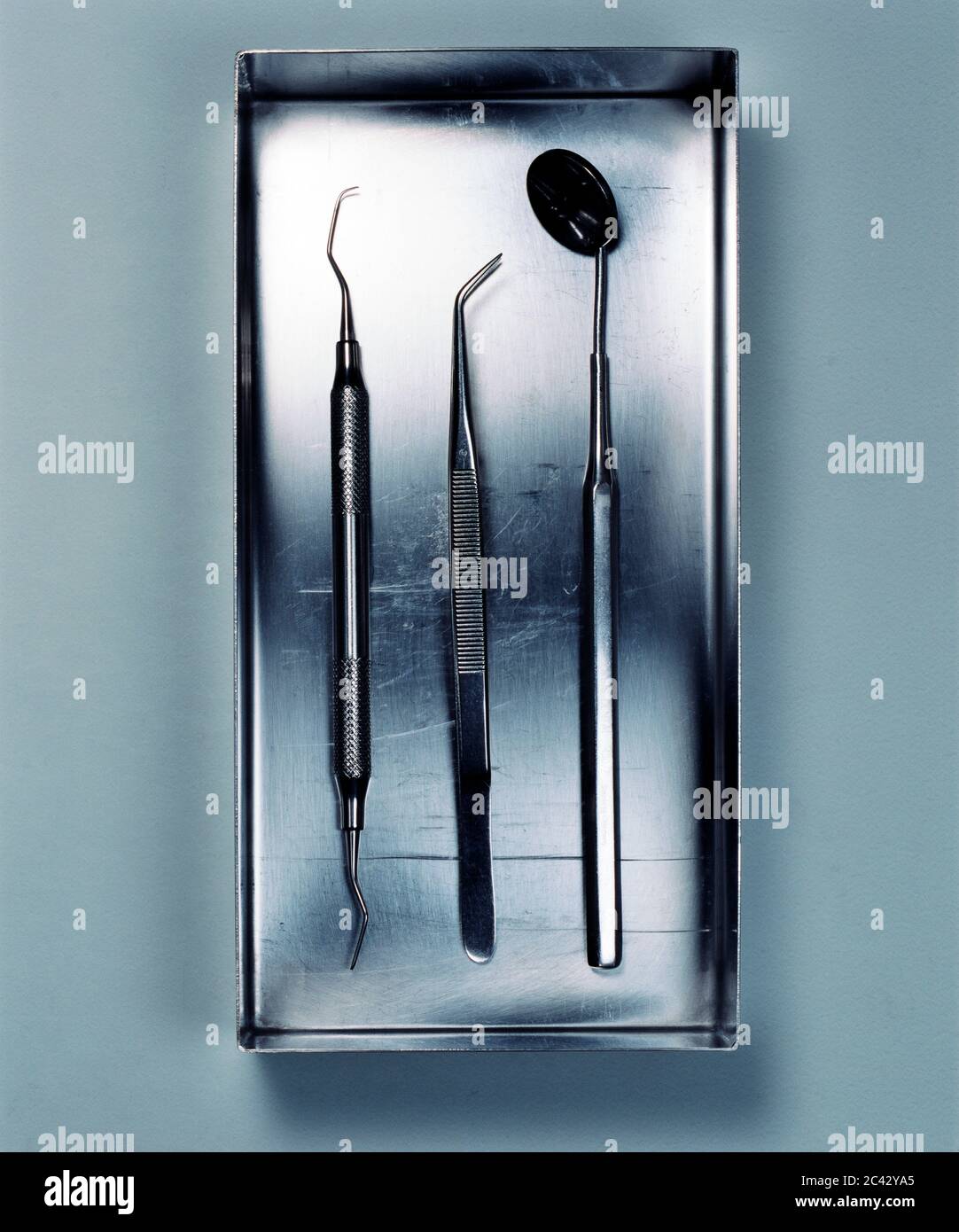 Dental probes and oral mirrors in one box - sterile Stock Photo - Alamy