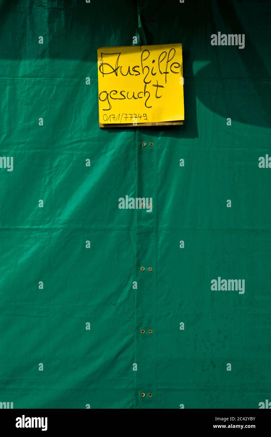 Temporary help sign on an Oktoberfest tarpaulin, Munich, Bavaria ...
