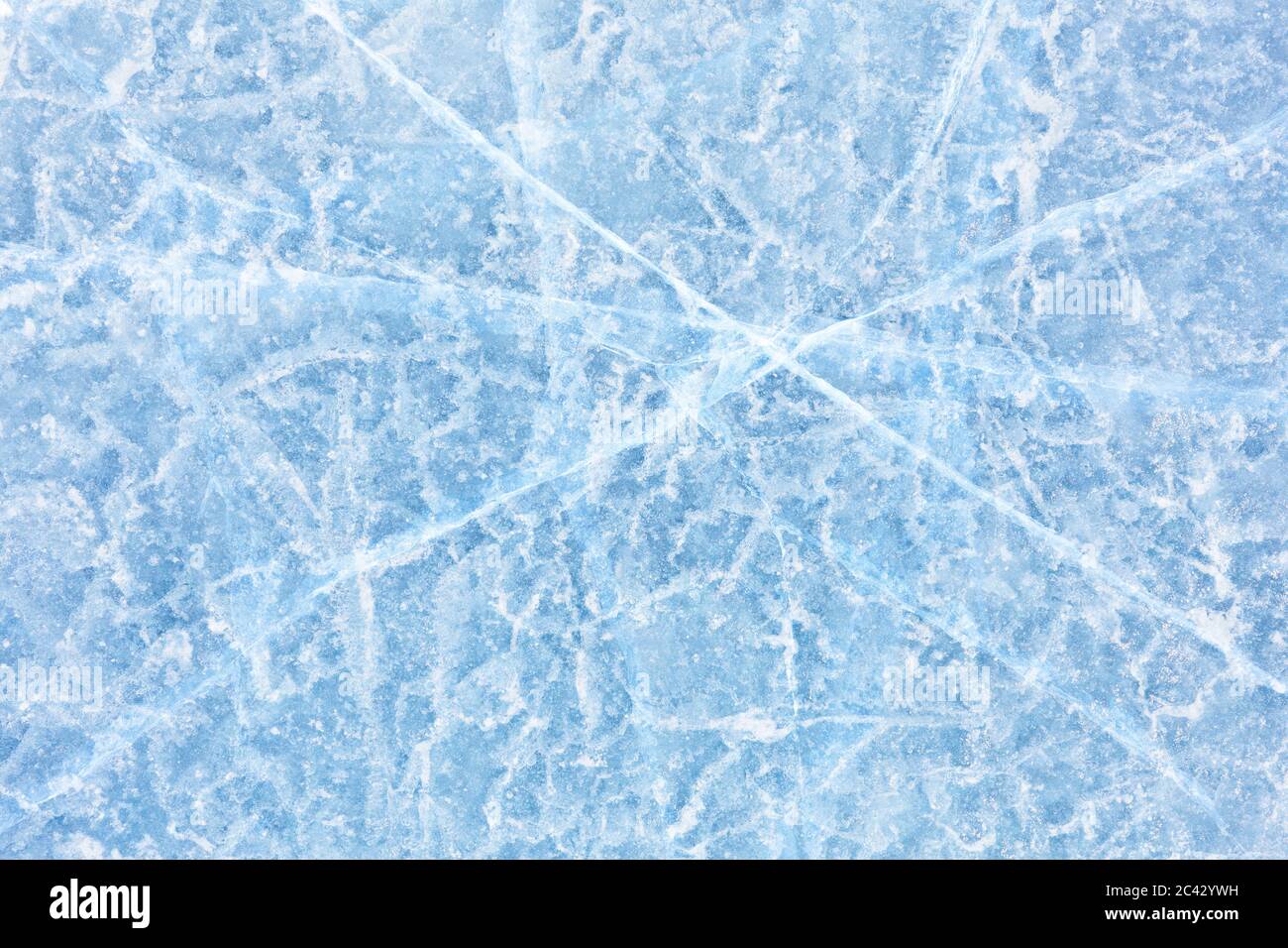 Surface of winter ice on Baikal lake in Siberia . Blue background of ...
