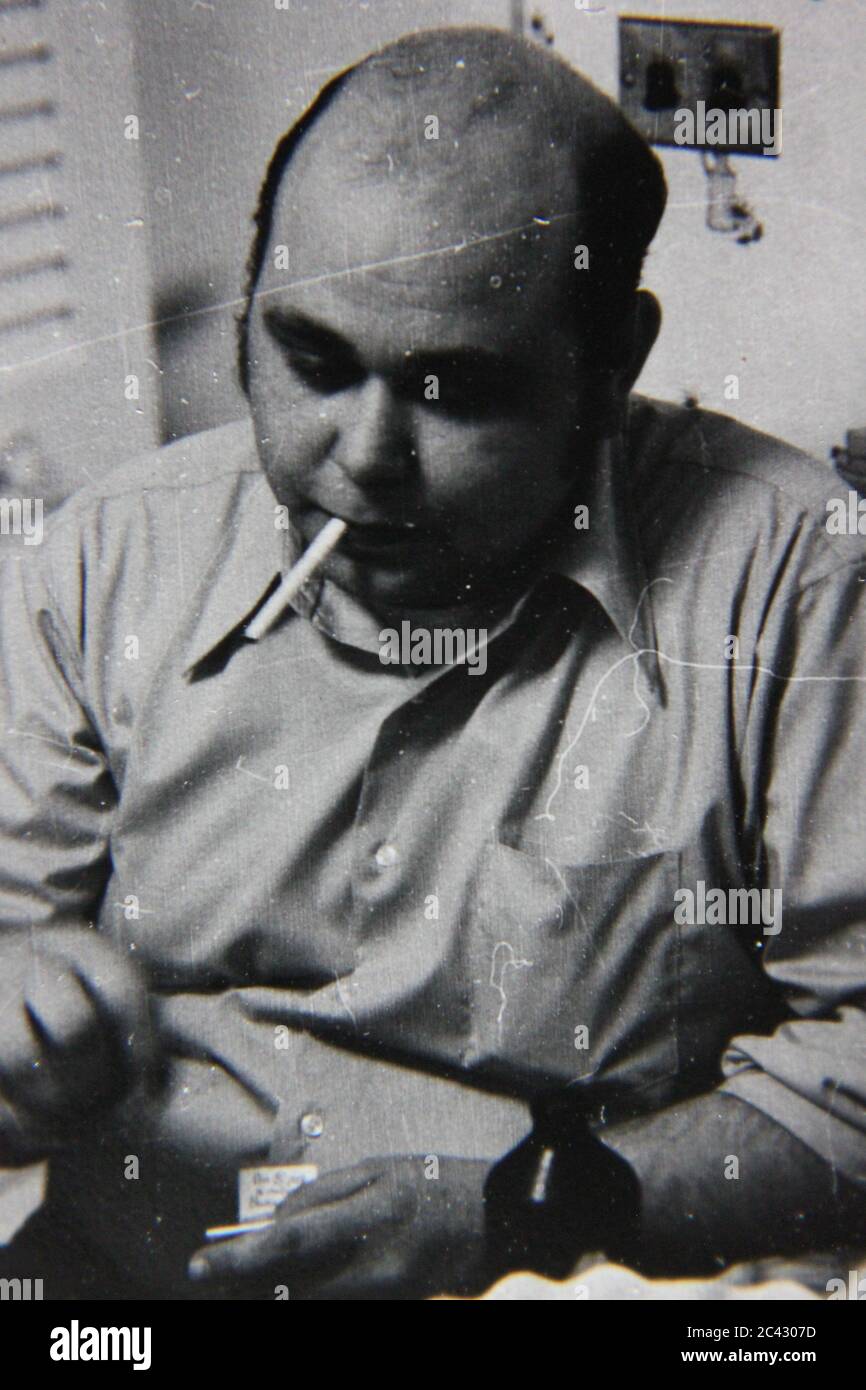 Fine 70s vintage black and white lifestyle photography of a smoker ...