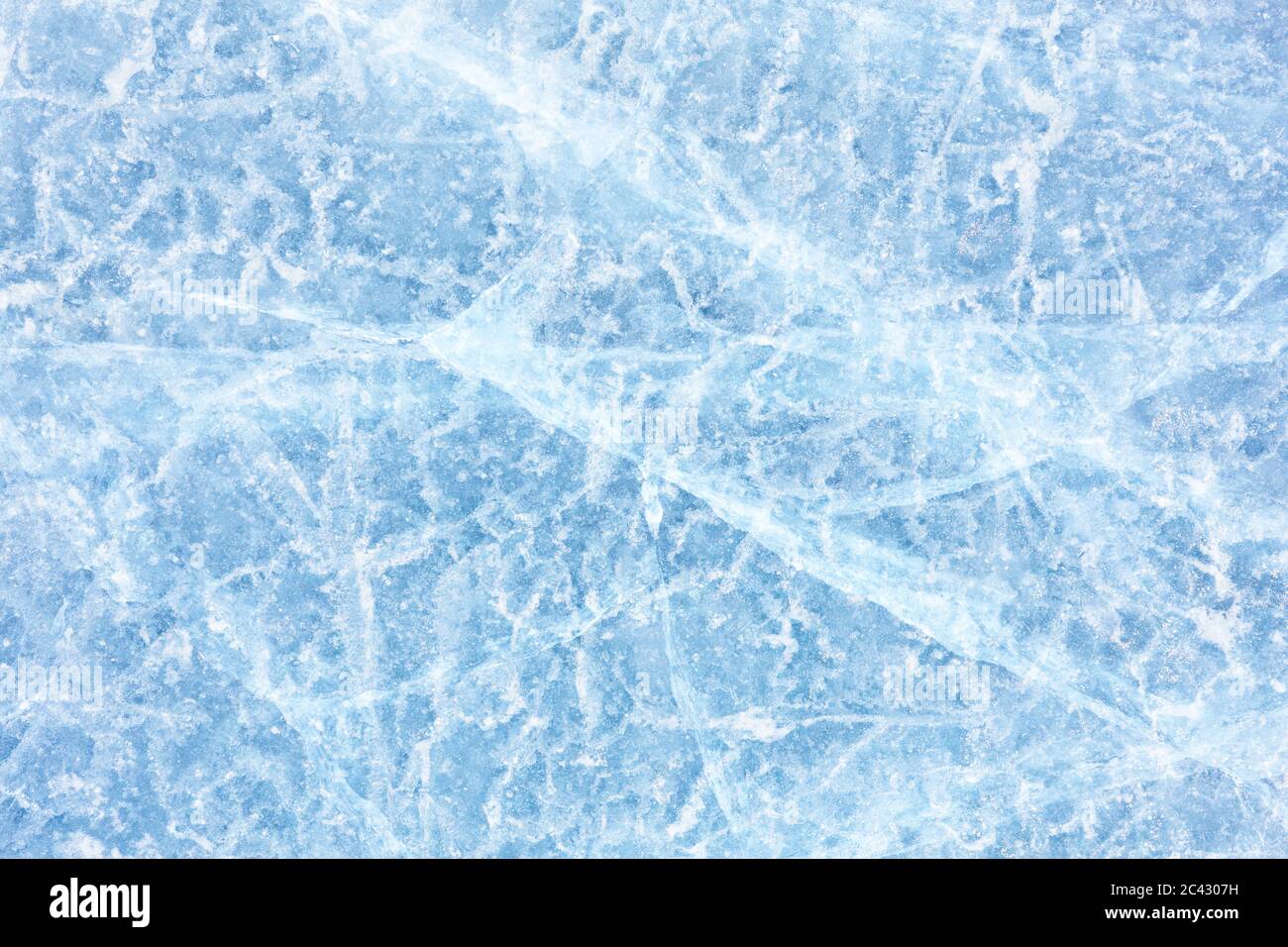 Surface of winter ice on Baikal lake in Siberia . Blue background of ...