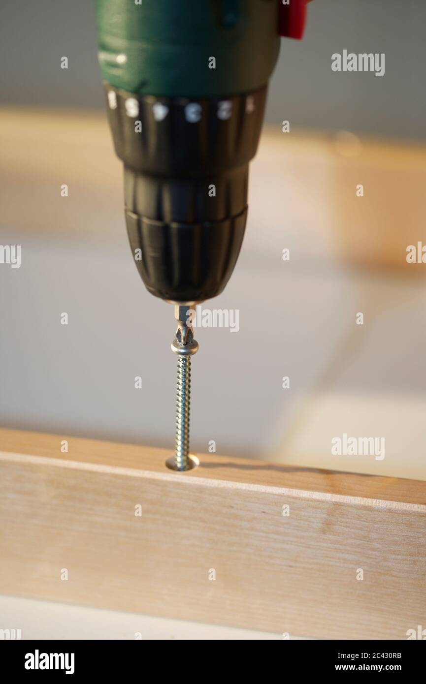 Drill on a screw Stock Photo - Alamy
