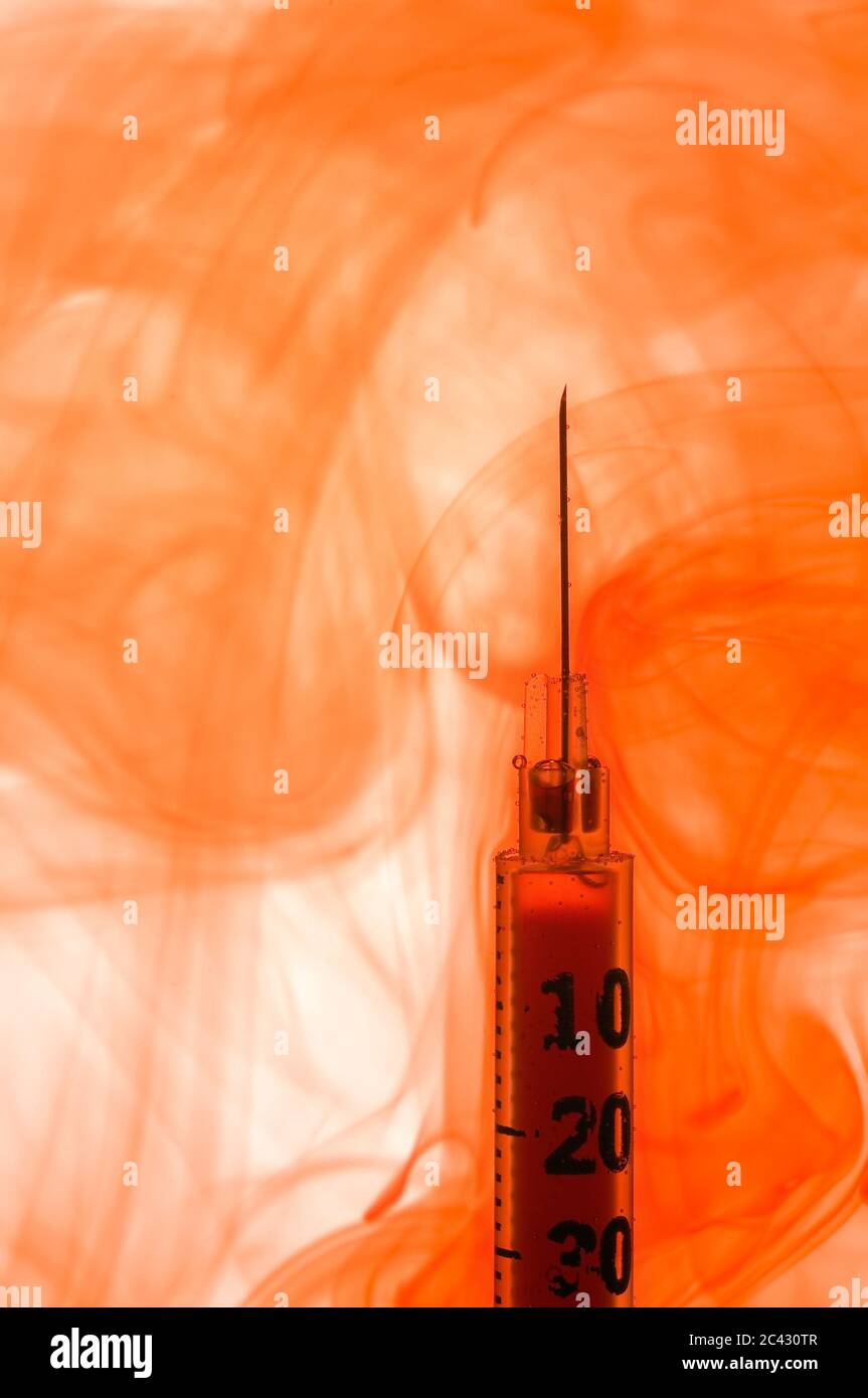 Concentrated and watery blood inside and outside a syringe - injection ...