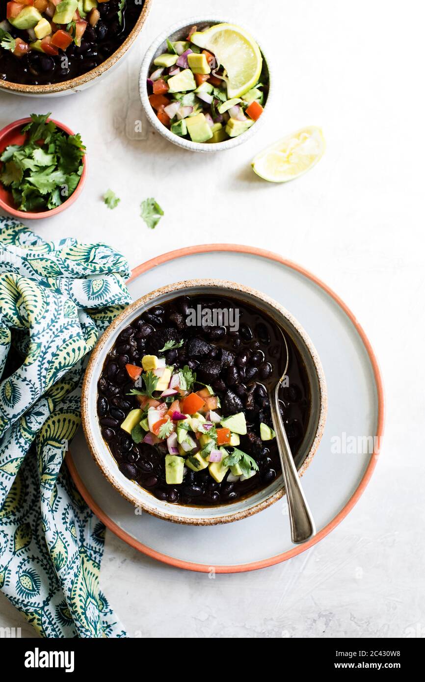 Black beans with avocado, tomato, red onion and cilantro Stock Photo - Alamy