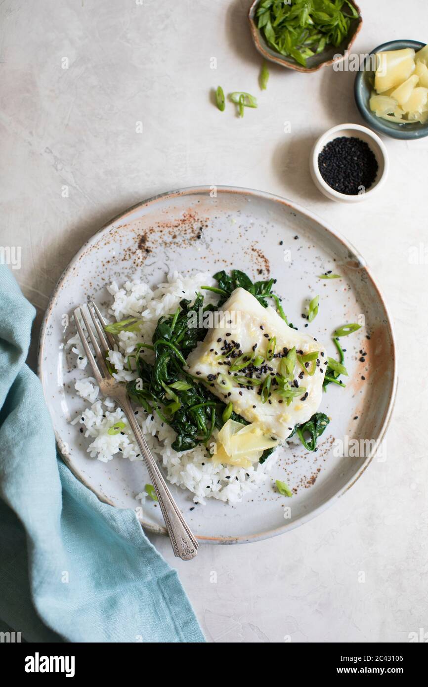 Baked white fish fillet, wilted spinach, green beans and spring onions ...