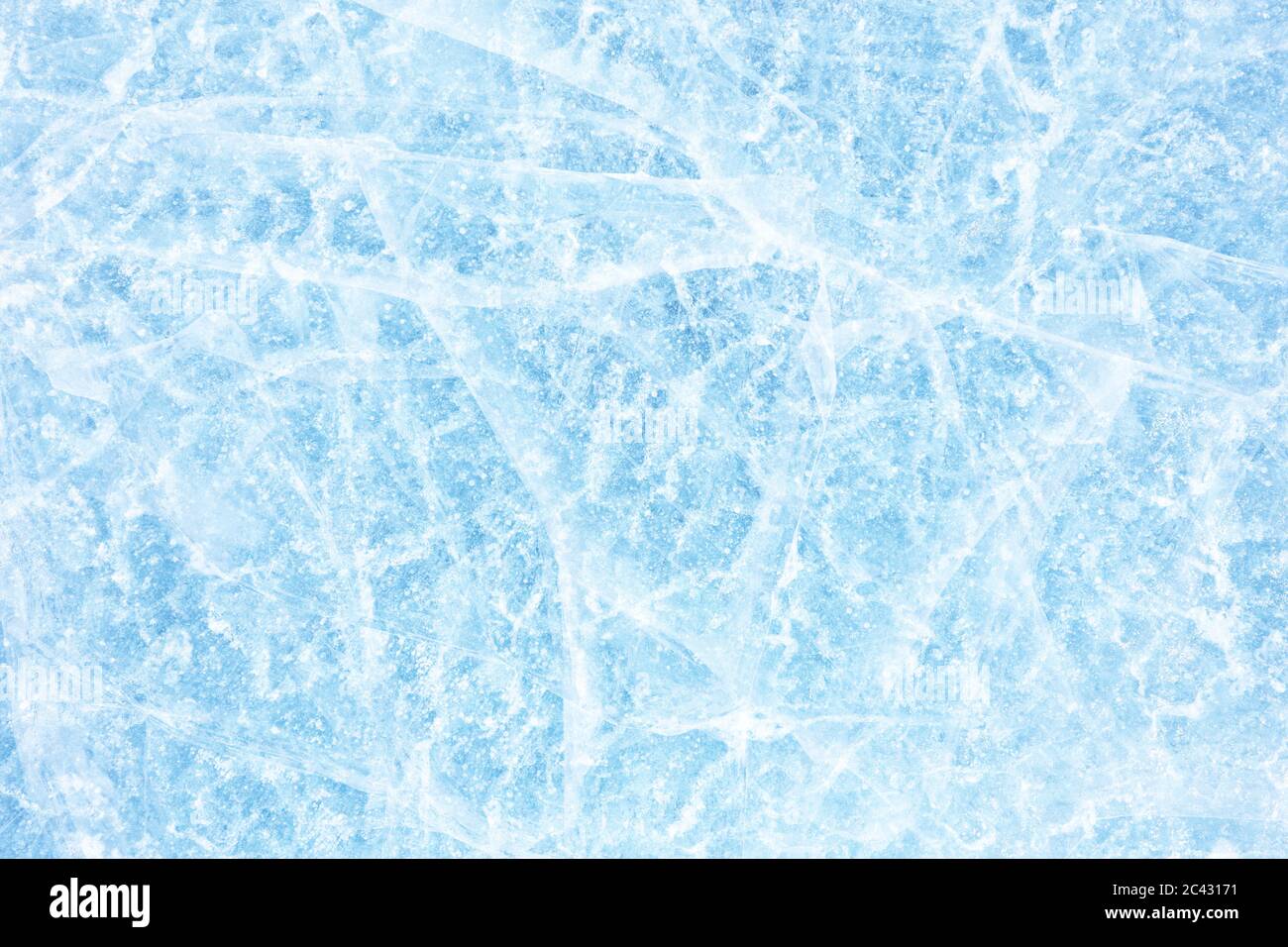 Surface of winter ice on Baikal lake in Siberia . Blue background of ...