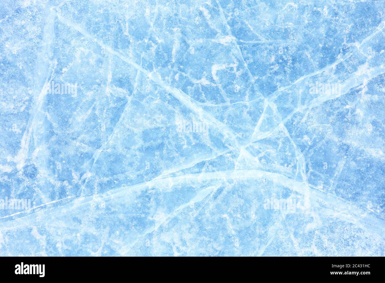 Surface of winter ice on Baikal lake in Siberia . Blue background of ...