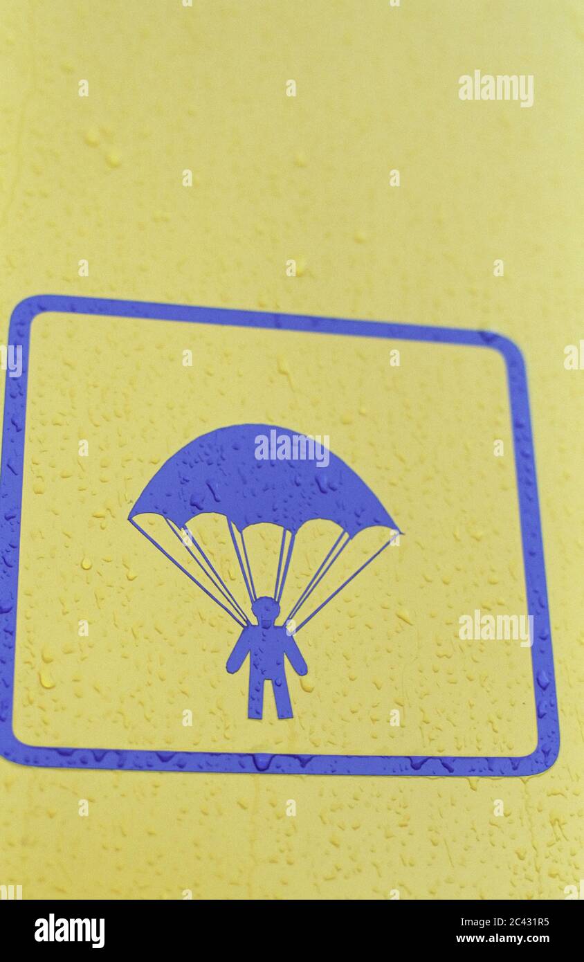 A sign showing a symbol of a parachute dropping - leisure Stock Photo ...
