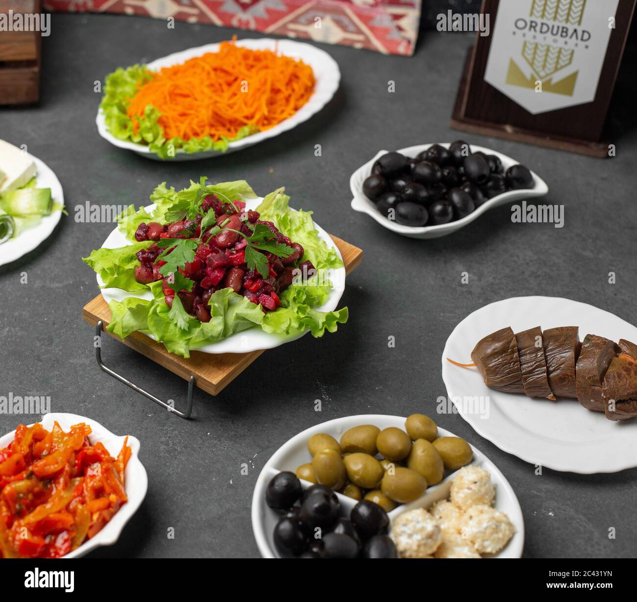 Russian vinegret salad on a lettuce with other salads around Stock ...