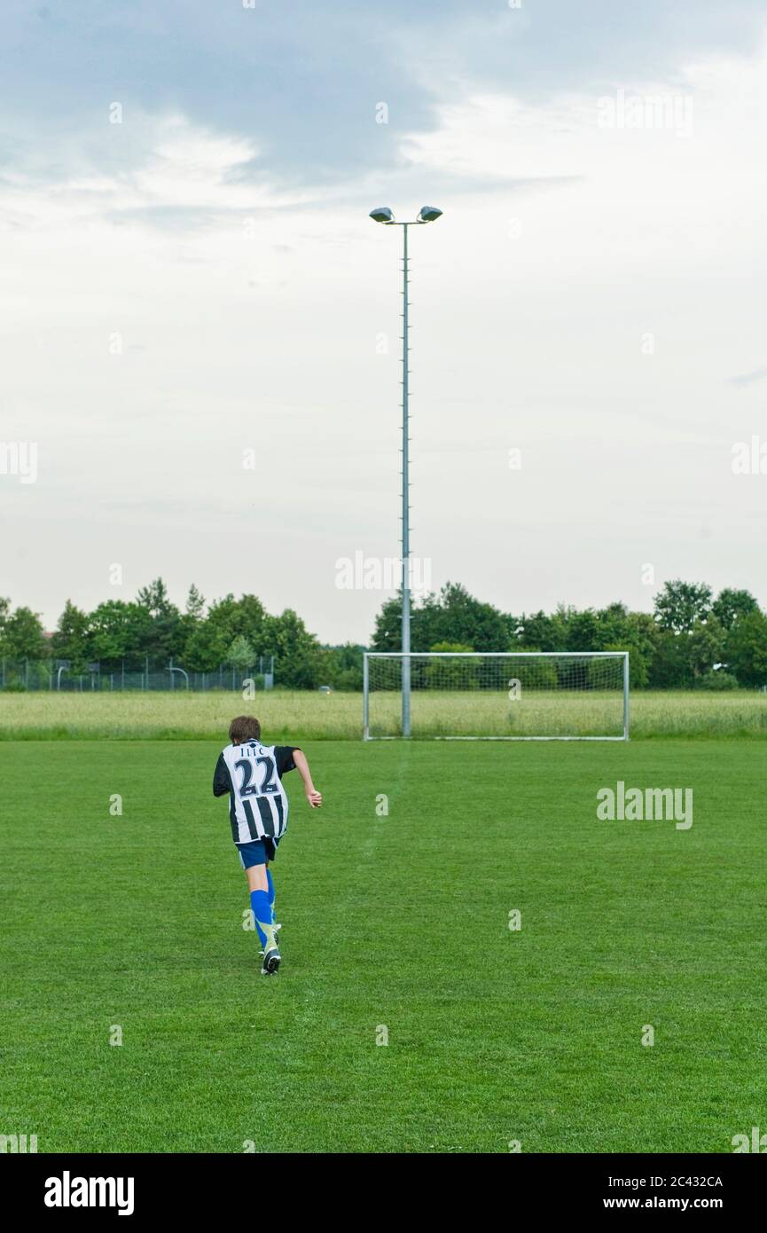 Football players on a soccer field, Munich, Bavaria, Germany Stock ...