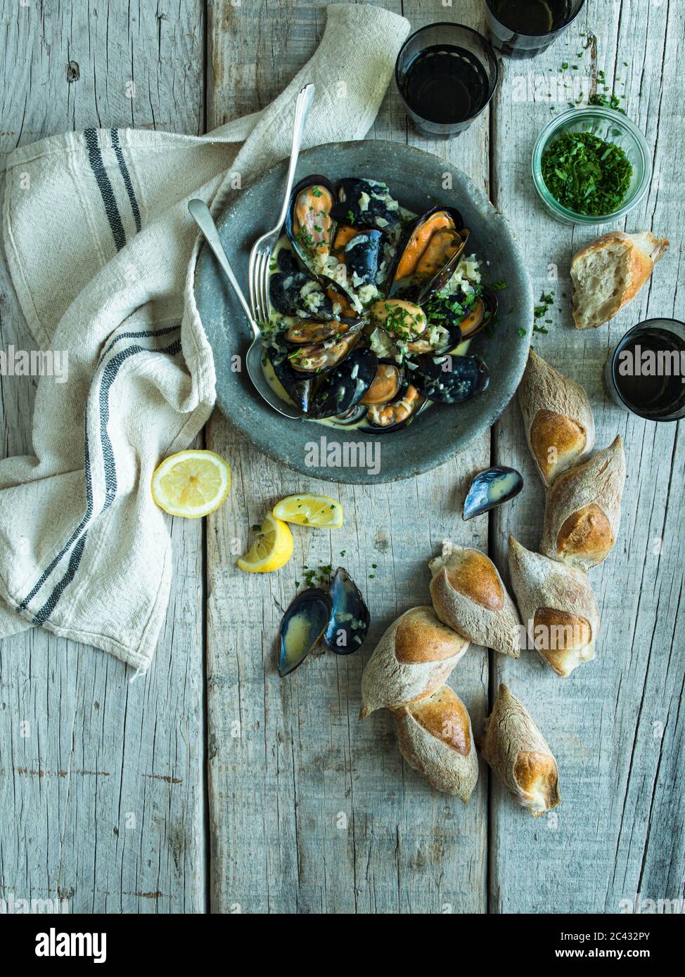 Steamed Mussels, bread and red wine Stock Photo - Alamy