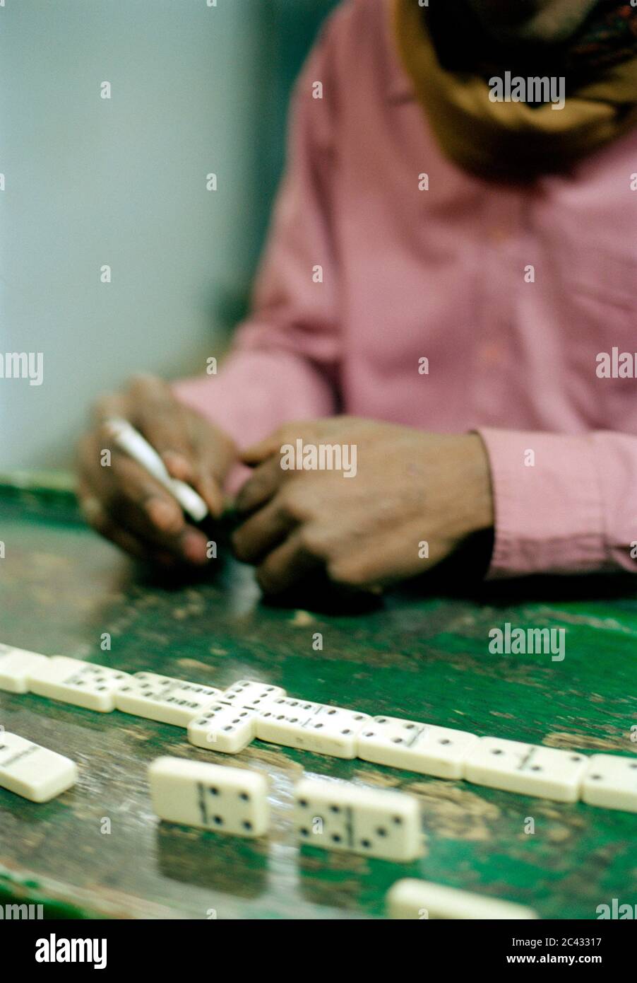 Man playing domino, Egypt Stock Photo - Alamy