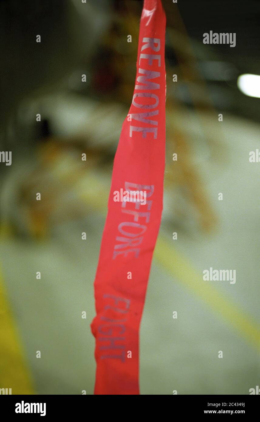 Security band on an airplane Stock Photo - Alamy