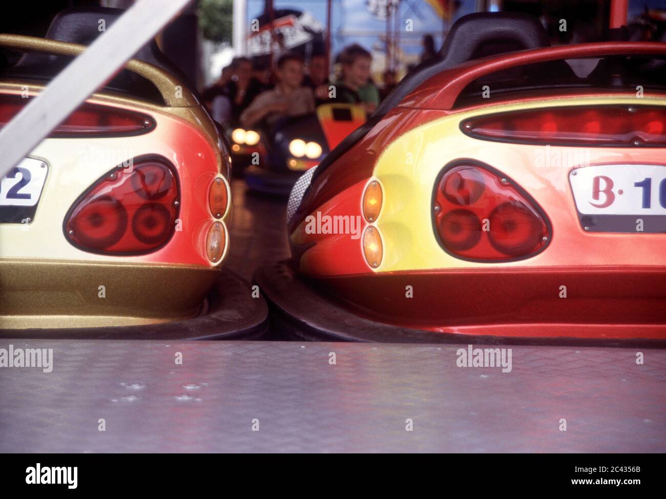 Yellow bumper cars hi-res stock photography and images - Alamy