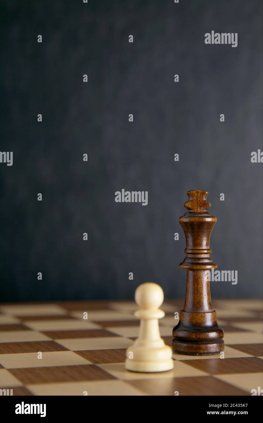 Chess pieces, king and pawn Stock Photo - Alamy