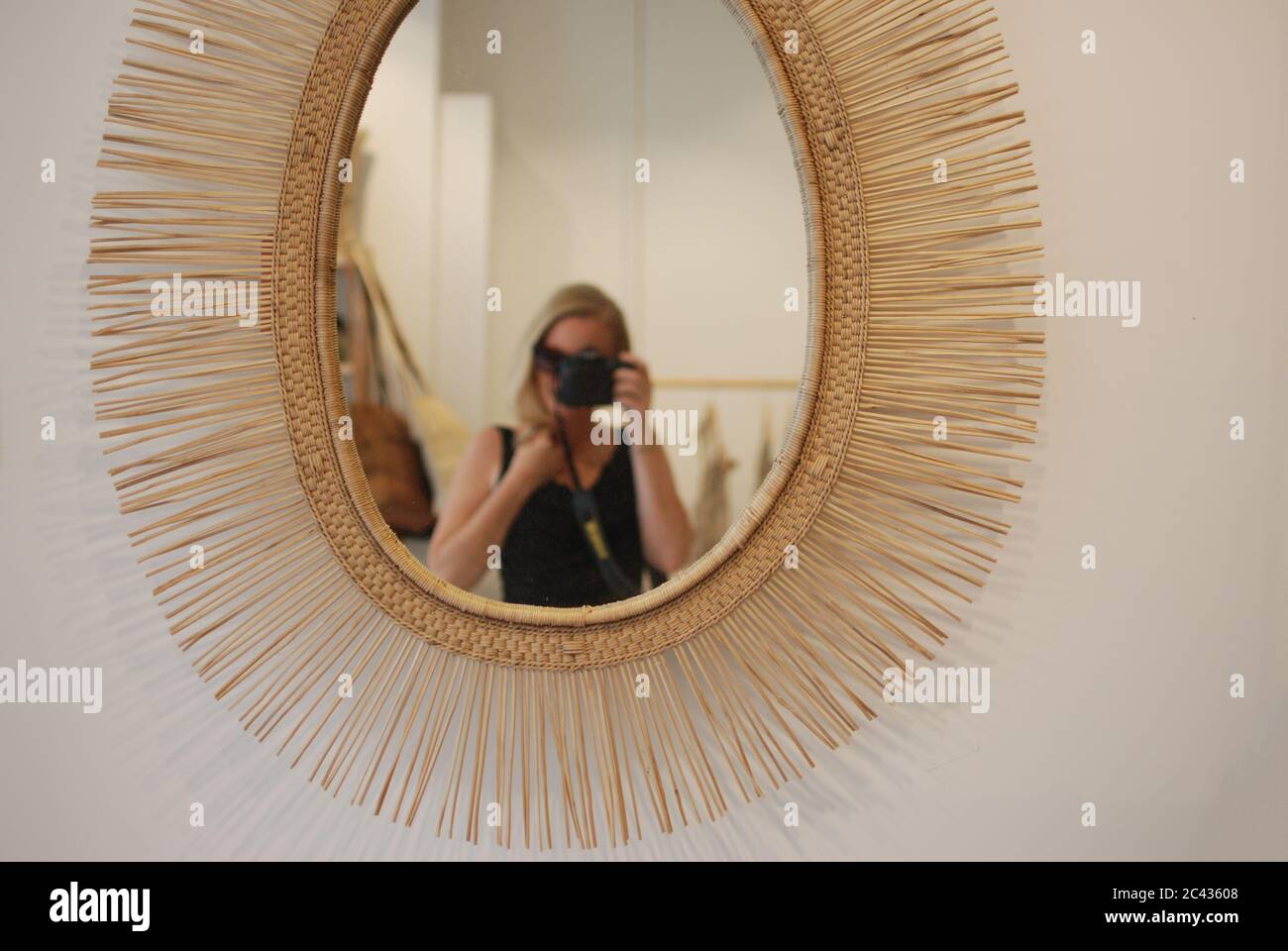 Sneaky self portrait in the mirror Stock Photo - Alamy