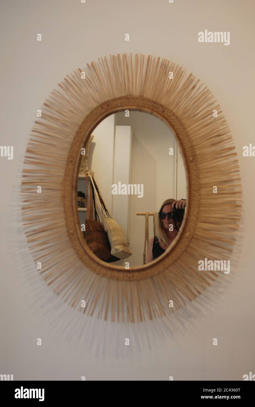 Sneaky self portrait in the mirror Stock Photo - Alamy