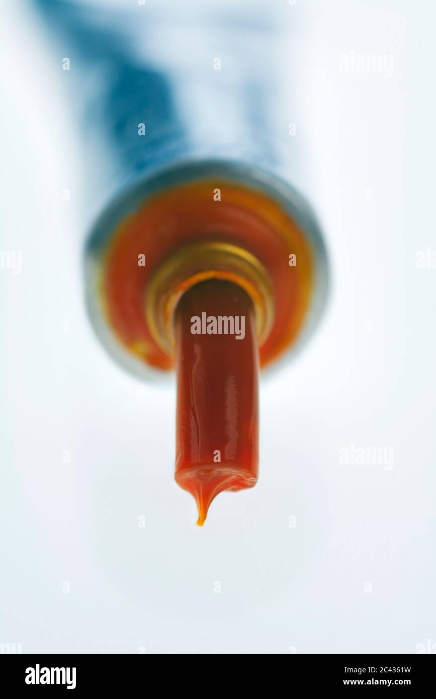 Red-orange colored paste Stock Photo - Alamy