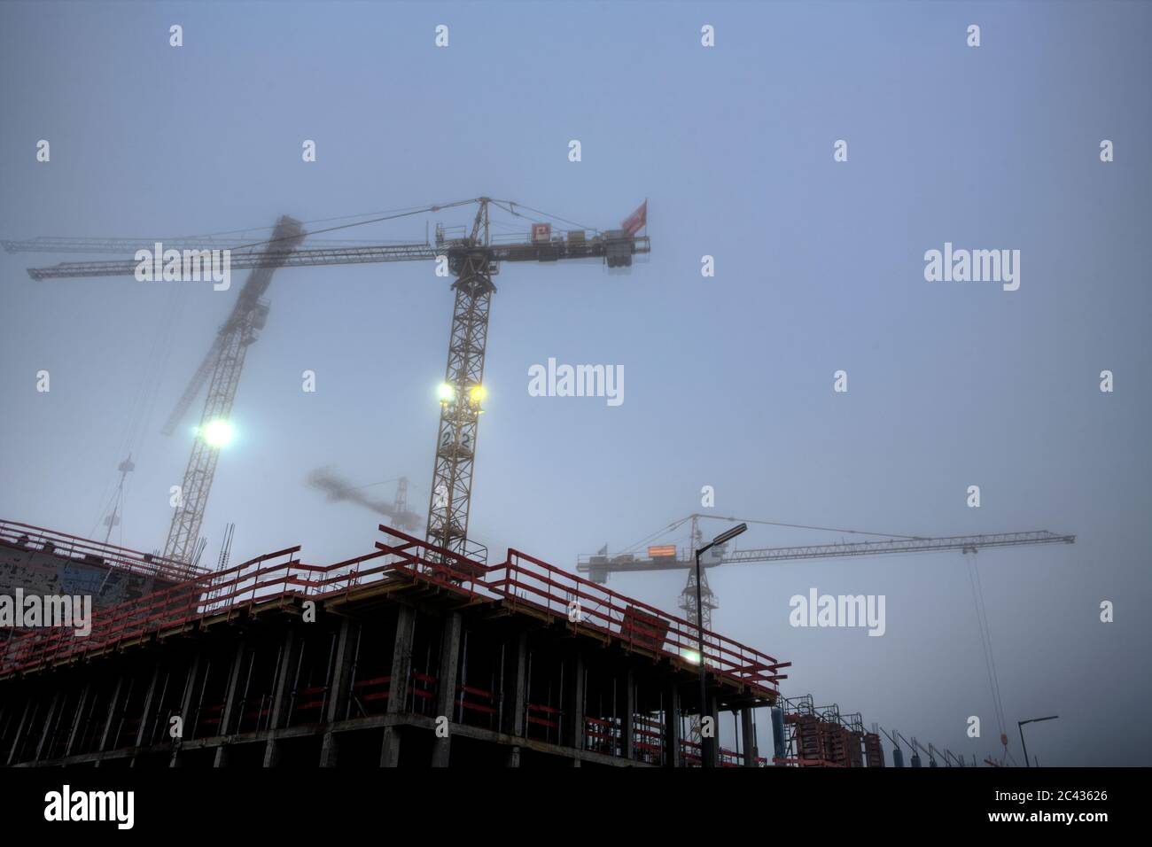 Large construction site in the fog Stock Photo - Alamy