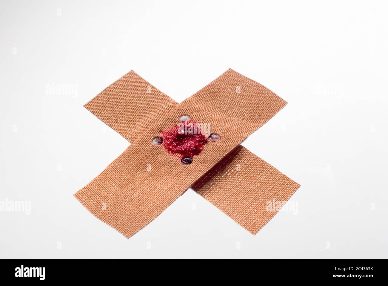 Adhesive plaster with blood Stock Photo - Alamy