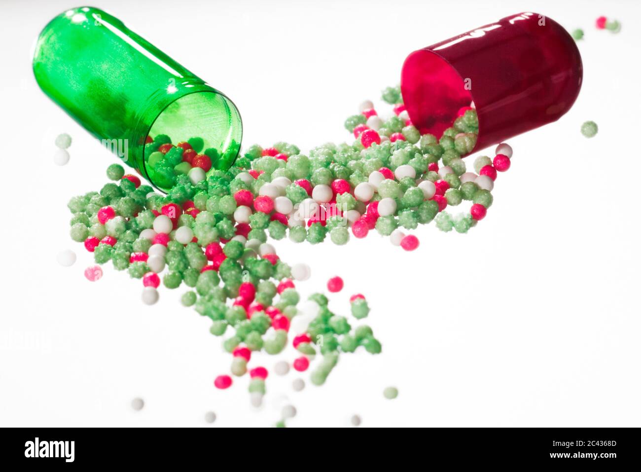 Granules from a capsule Stock Photo - Alamy