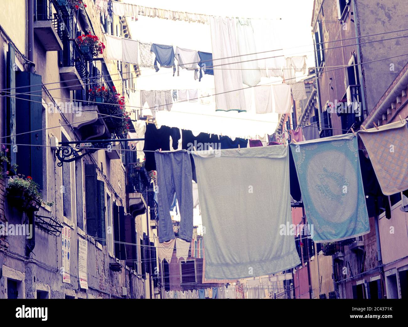 Road with clothesline - street scene - travel Stock Photo - Alamy