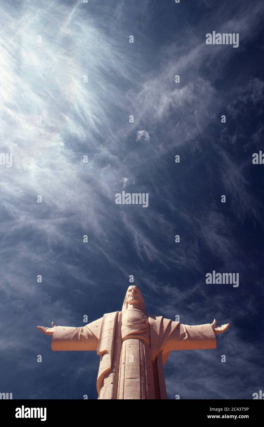 Jesus statue under blue sky - Christianity - Faith Stock Photo - Alamy