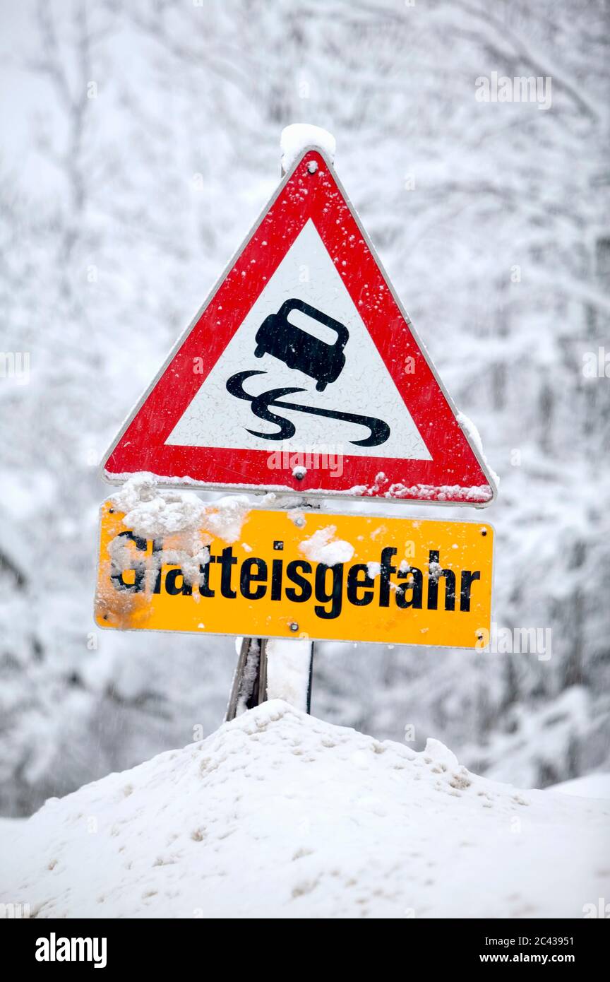 Road sign danger of slipping Stock Photo - Alamy