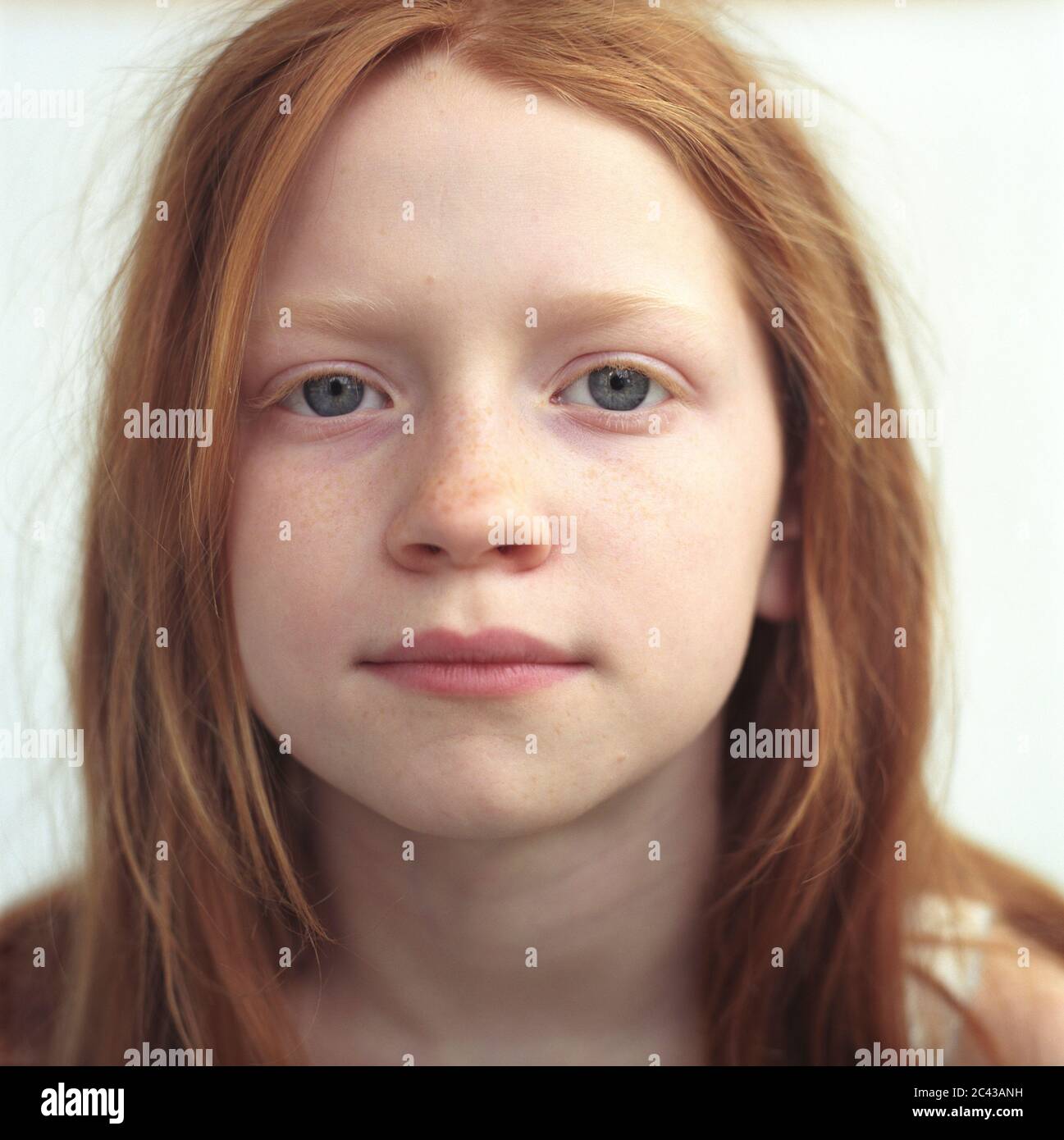 Girl with long, red hair that falls on her neck - physicality Stock ...