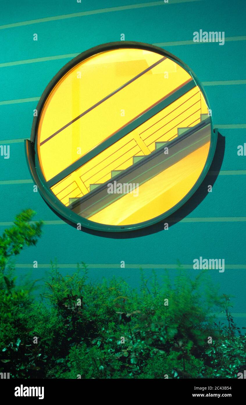 View of a staircase through a round window Stock Photo - Alamy