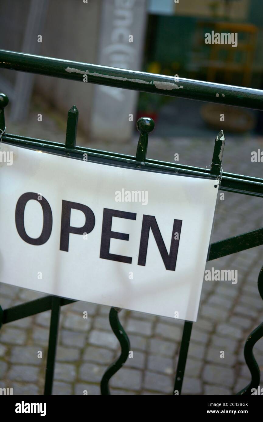 "Open" sign on a gate Stock Photo - Alamy