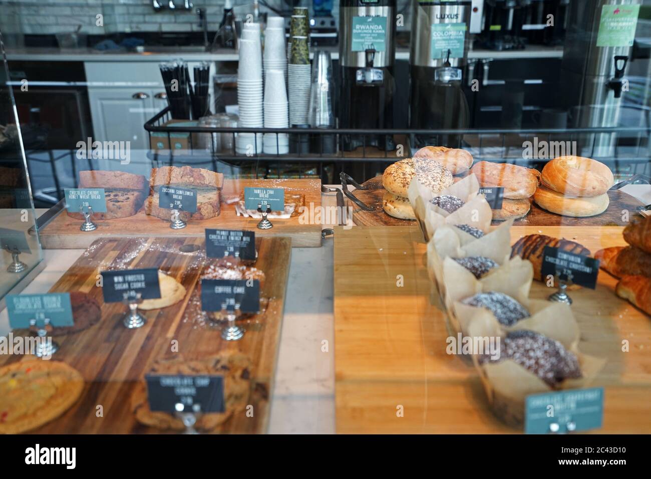 Assortment of bakery displayed in showcase glass box Stock Photo - Alamy