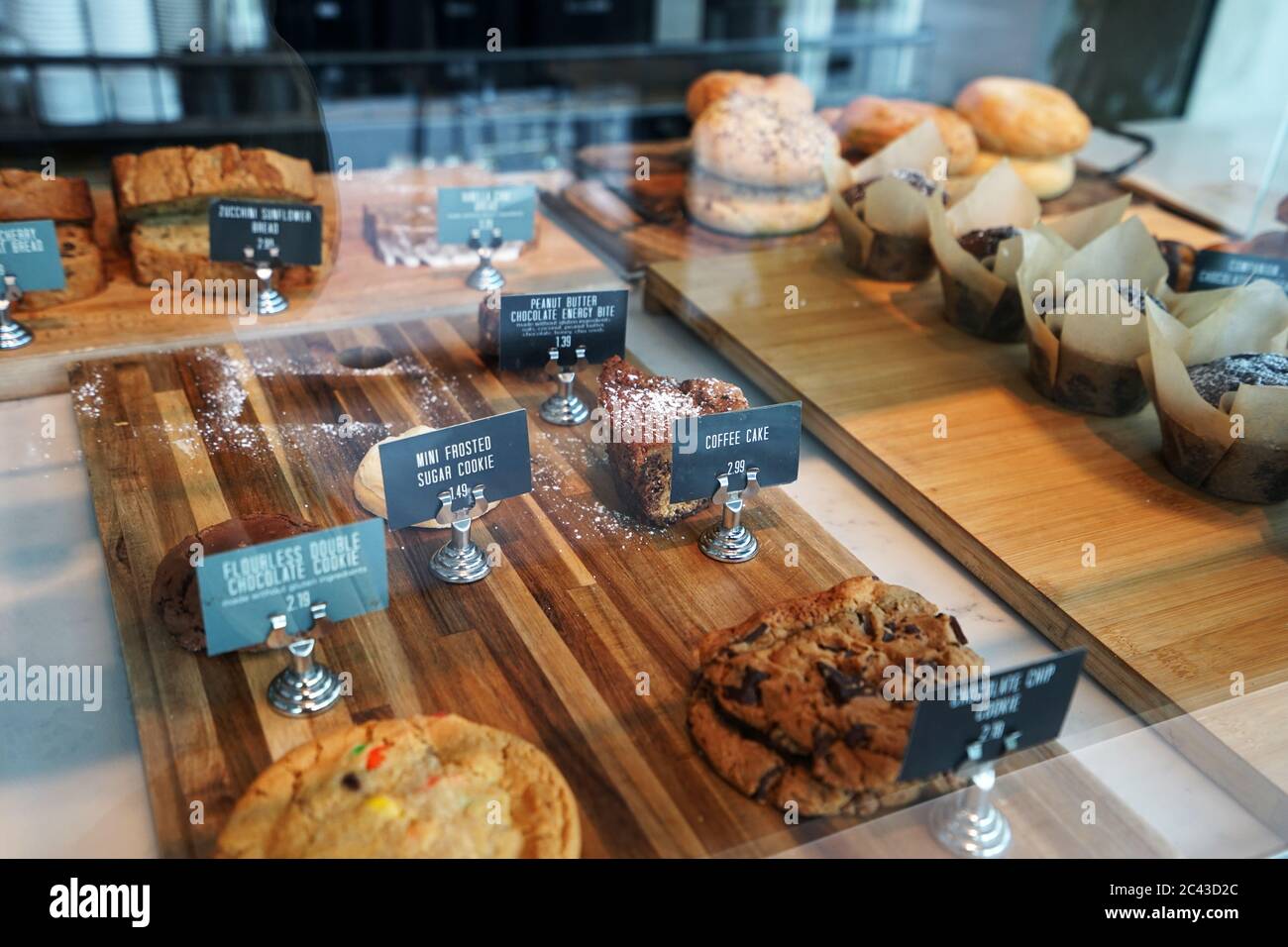 Assortment of bakery displayed in showcase glass box Stock Photo - Alamy