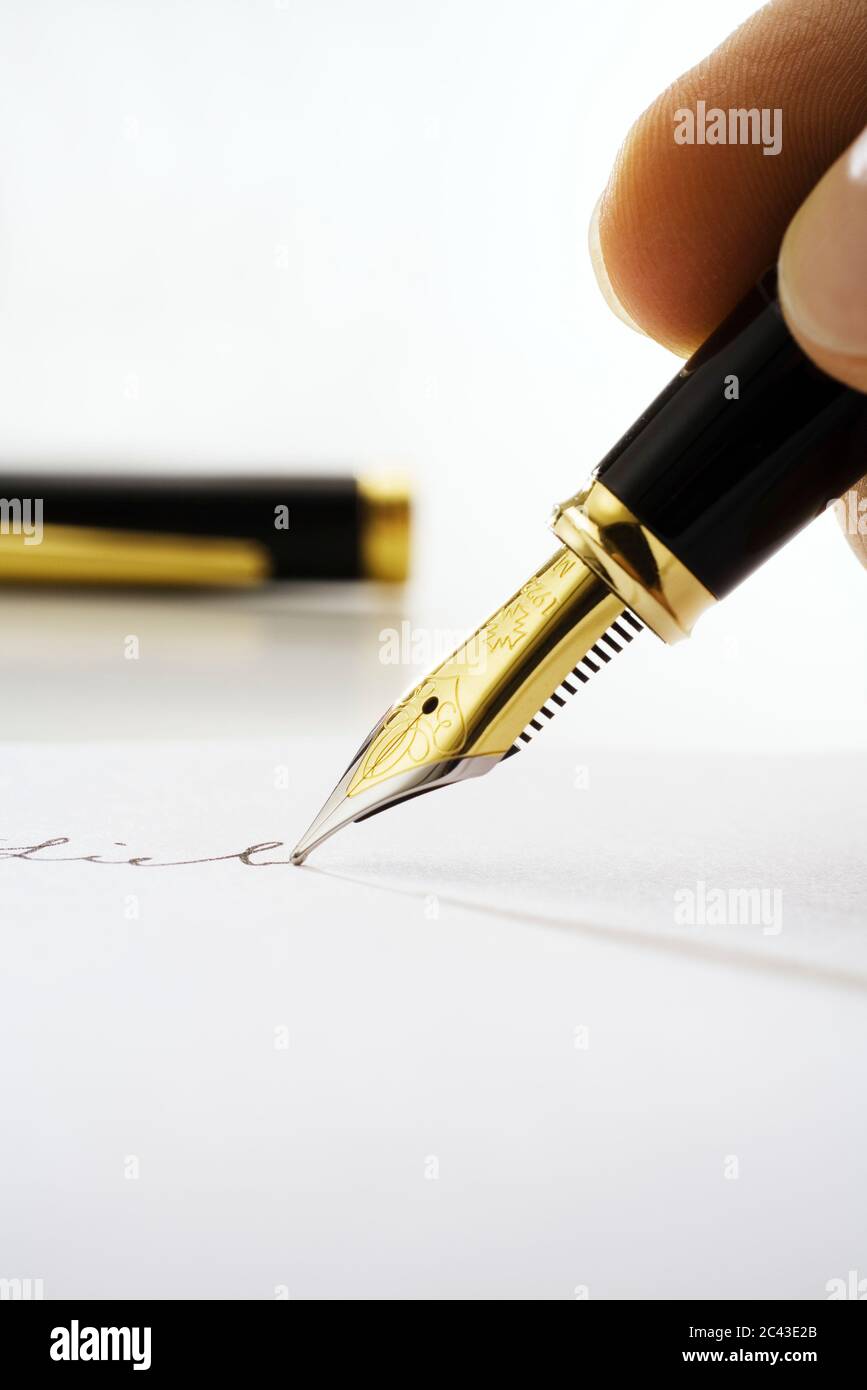 Hand piece of paper fountain pen hi-res stock photography and images ...
