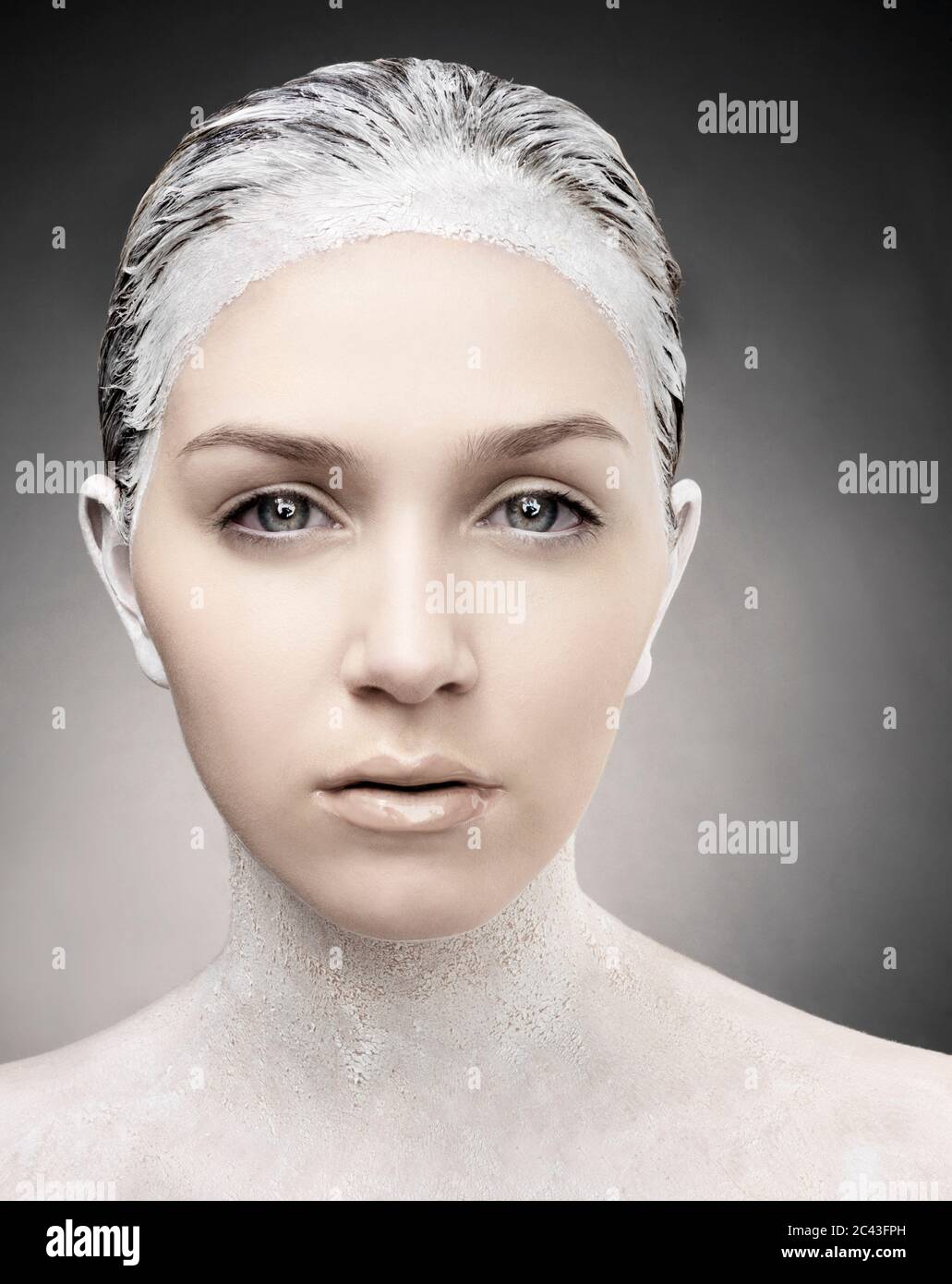 Young woman with cream on her skin Stock Photo - Alamy