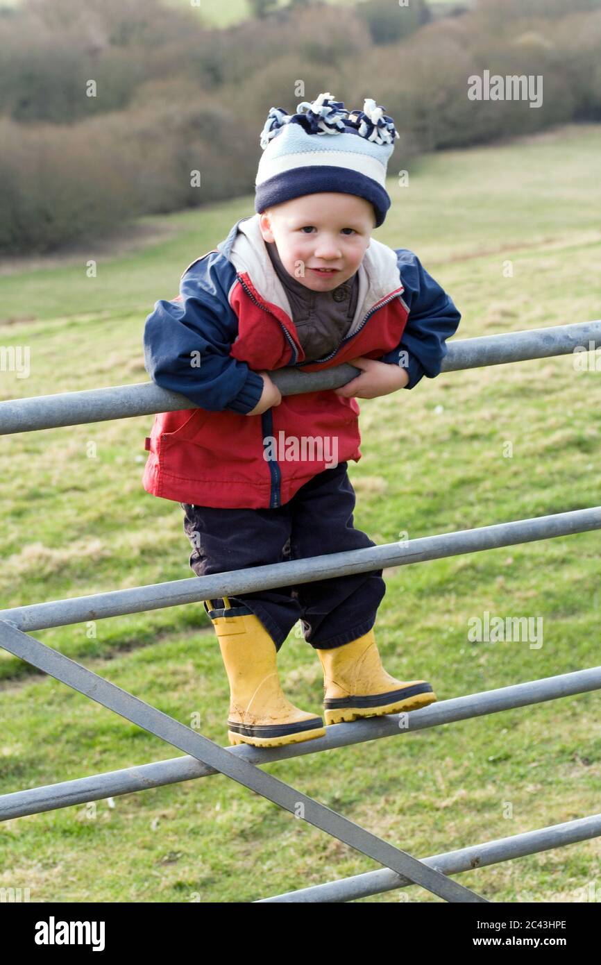 Boy meadow gate hi-res stock photography and images - Alamy