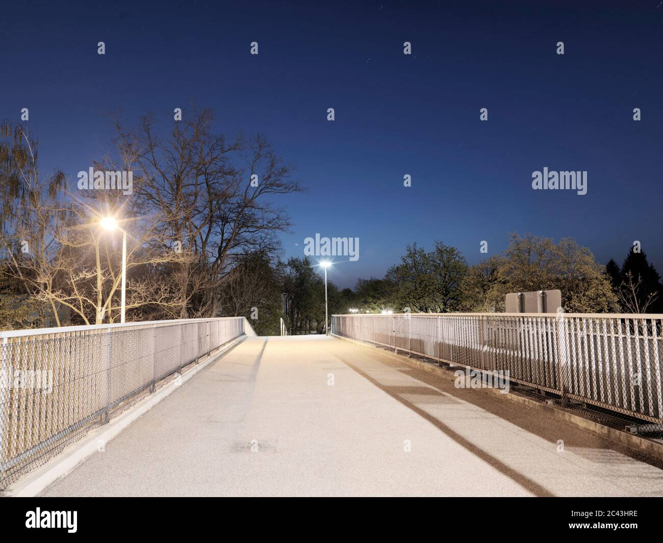 Illuminated pedestrian bridge hi-res stock photography and images - Alamy