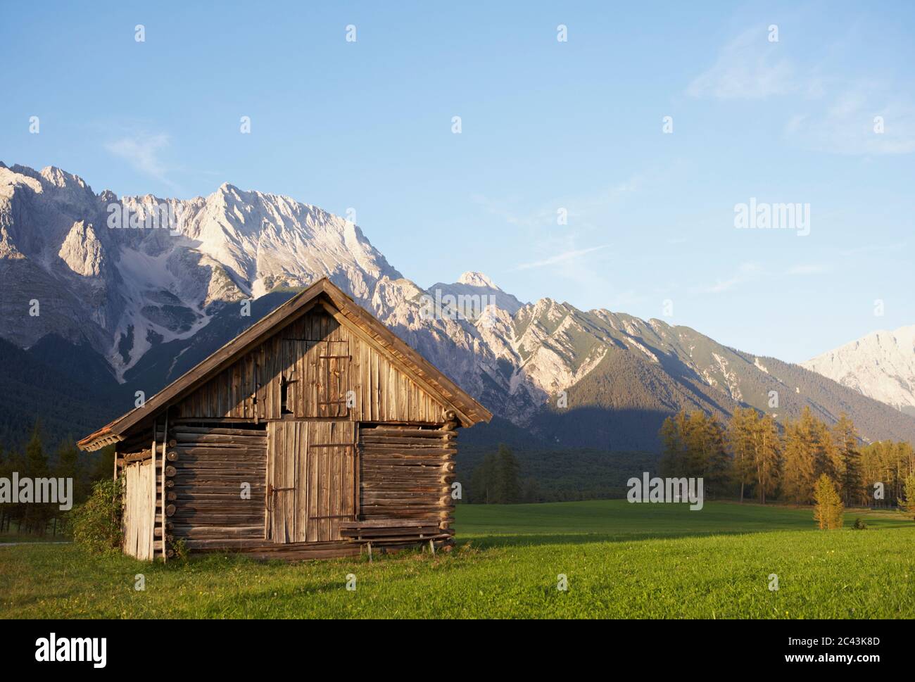 Barn in front of a mountain panorama Stock Photo - Alamy